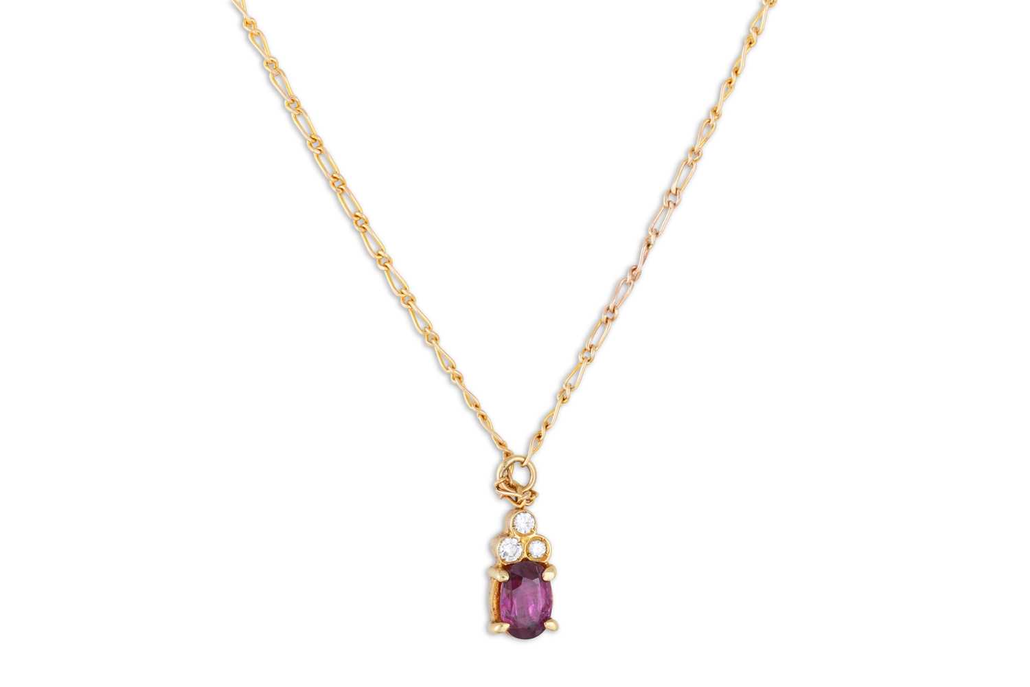 Lot 232 - A DIAMOND AND RUBY PENDANT, mounted in gold,