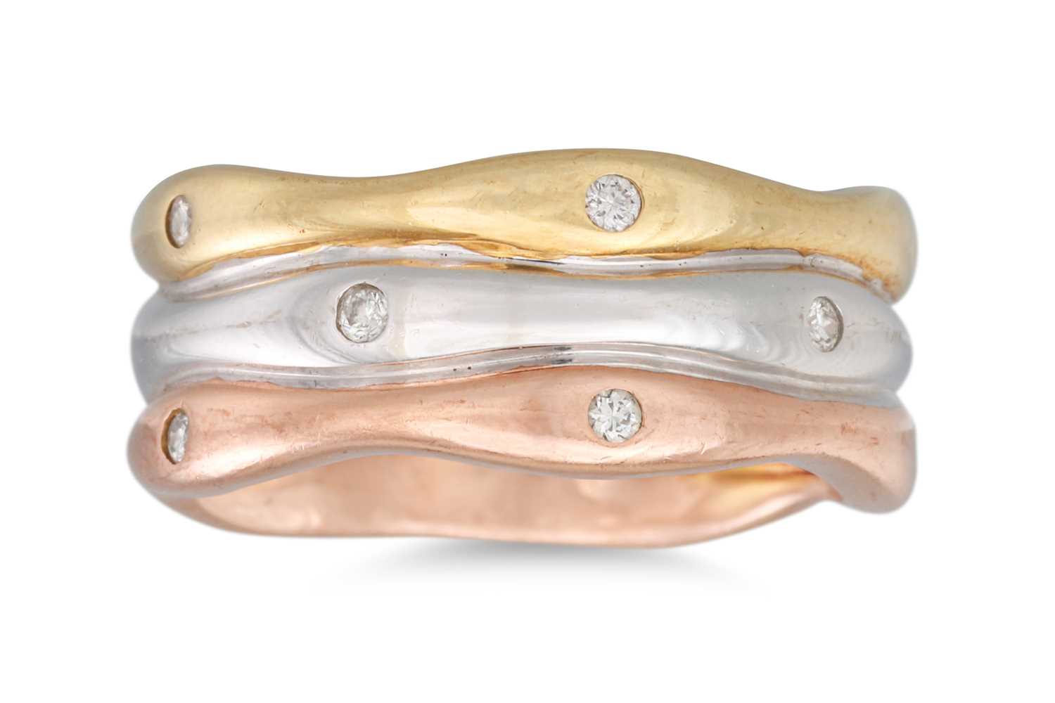 Lot 54 - A DIAMOND SET THREE COLOUR GOLD RING, set