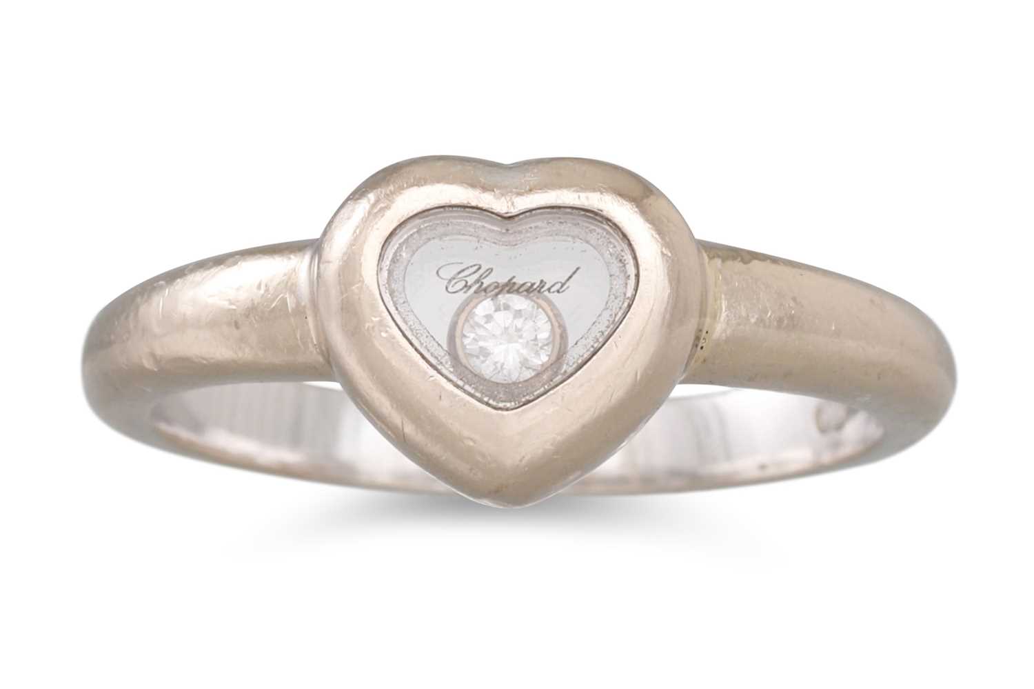Lot 313 - A CHOPARD HEART SHAPED HAPPY DIAMOND RING,