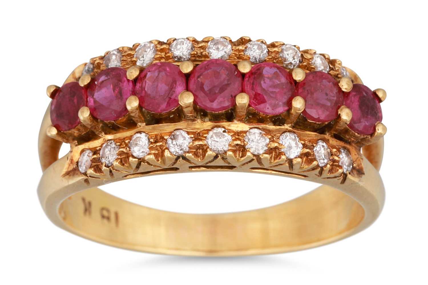 Lot 98 - A VINTAGE DIAMOND AND RUBY DRESS RING, three