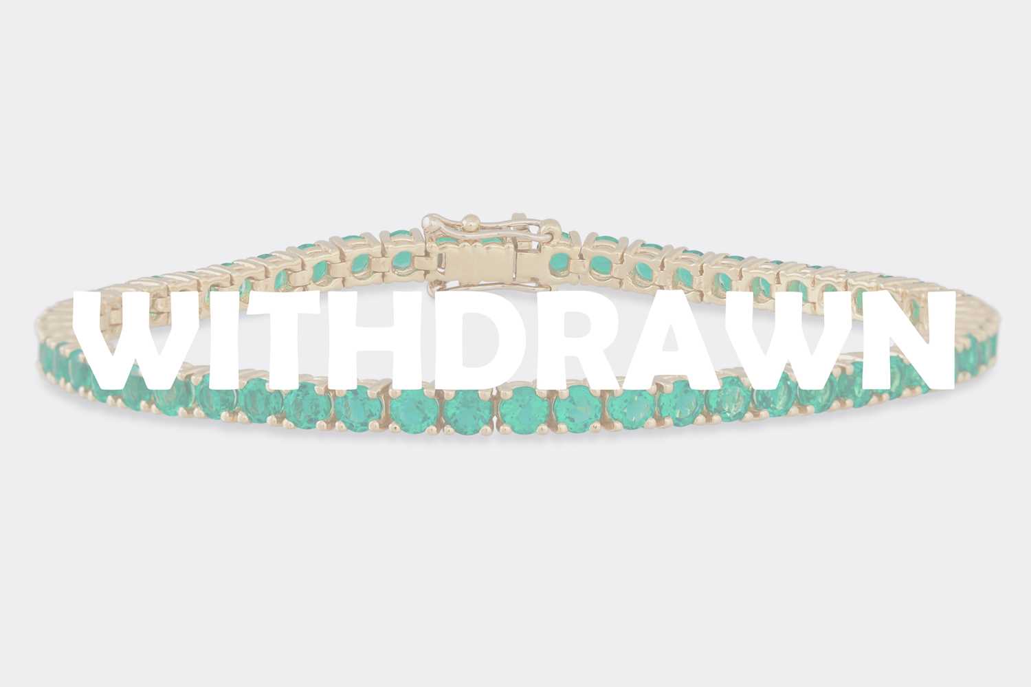 Lot 326 - AN EMERALD LINE BRACELET, the circular