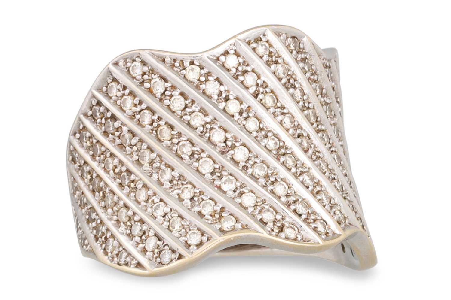 Lot 121 - A PAVÉ SET DIAMOND RING, shaped form,