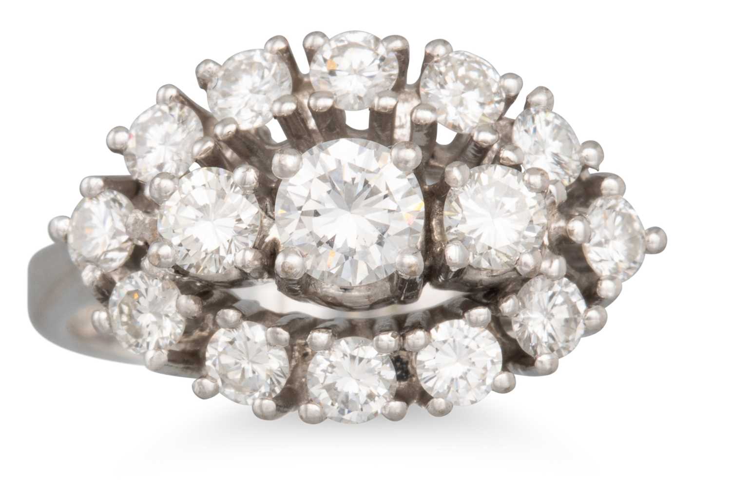 Lot 140 - A BOAT SHAPED DIAMOND CLUSTER RING, the