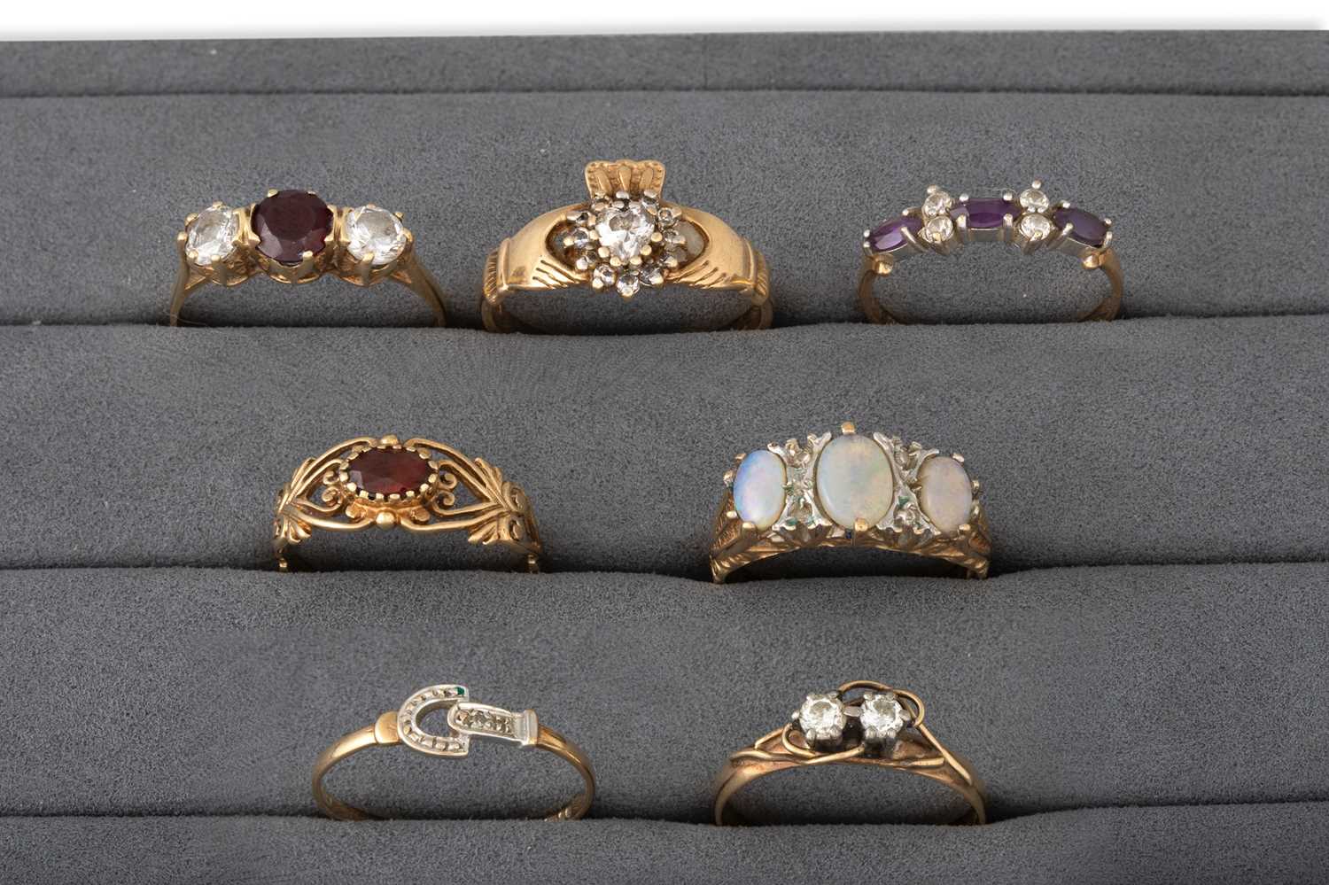 Lot 95 - SEVEN 9CT GOLD RINGS, one diamond set, gross