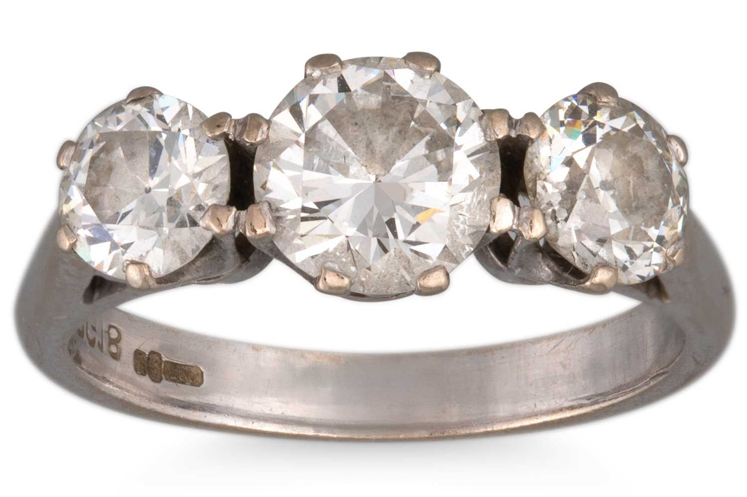 Lot 181 - A DIAMOND THREE STONE, the graduated stones