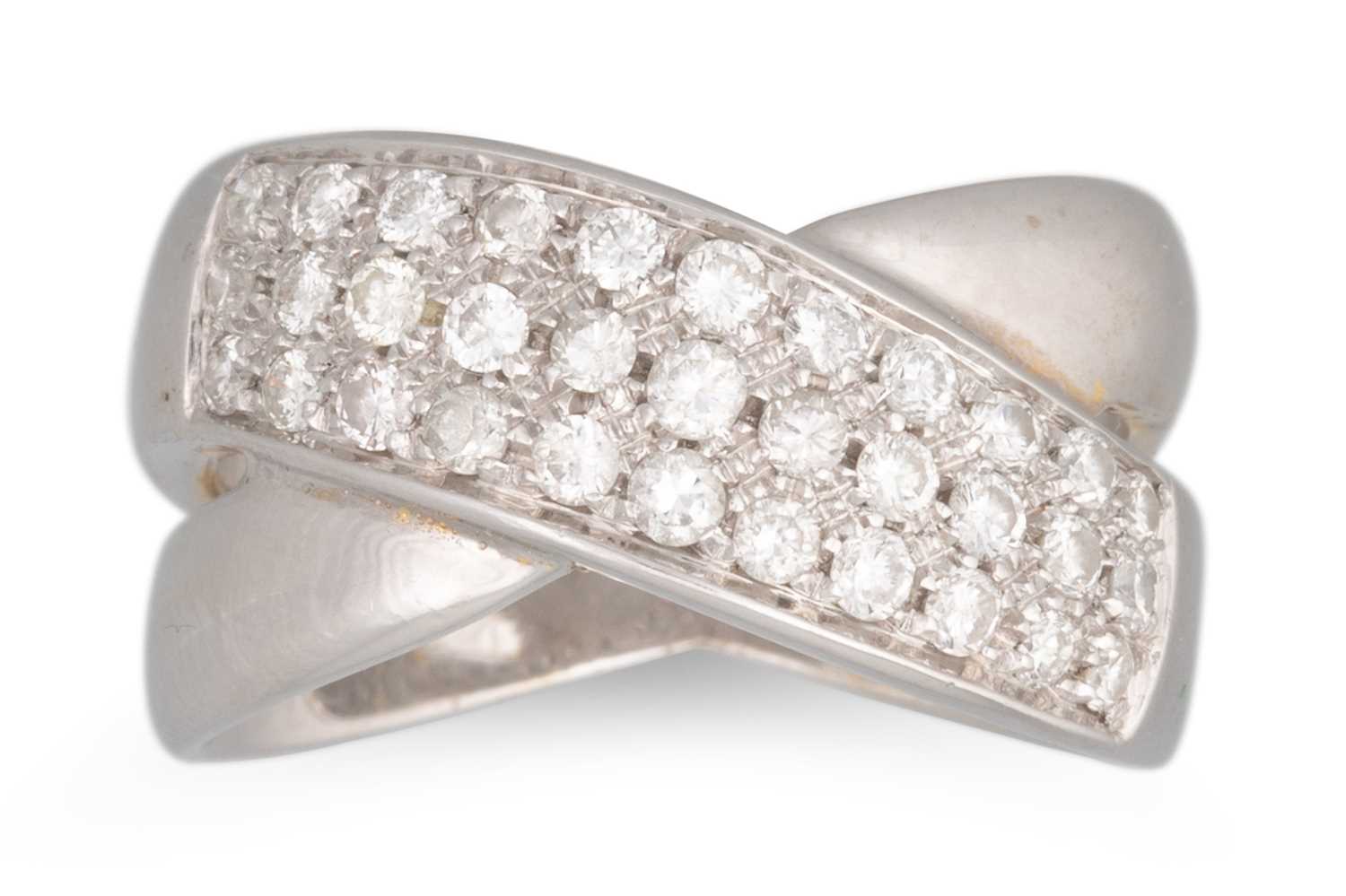 Lot 283 - A PAVÉ SET DIAMOND RING, cross-over design,