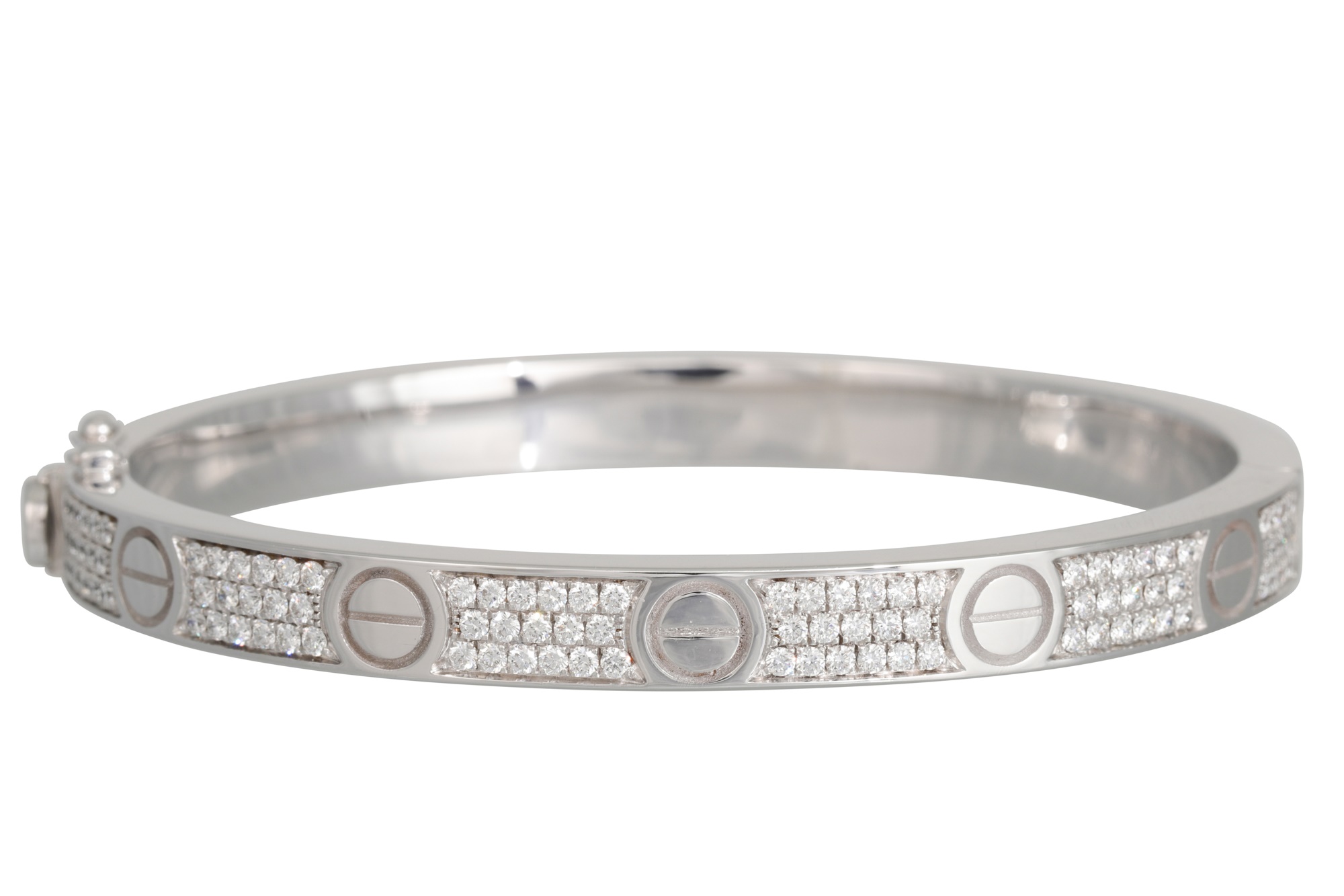 Lot 137 - A DIAMOND PAVE SET BANGLE, hinged, mounted