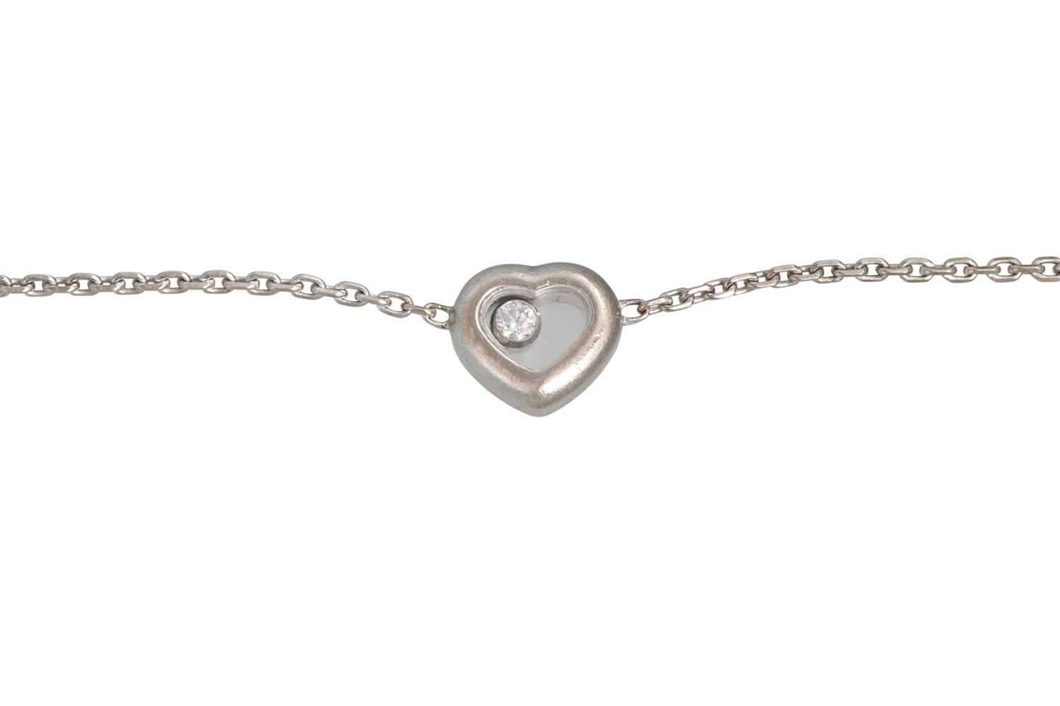 Lot 34 - A CHOPARD “HAPPY DIAMONDS” BRACELET, set with