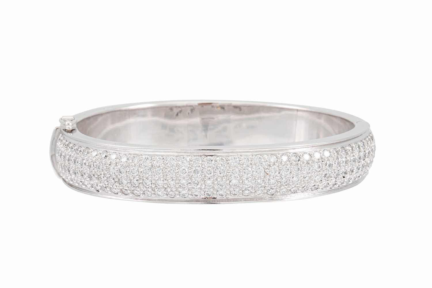 Lot 362 - A DIAMOND SET BANGLE, Pave set with
