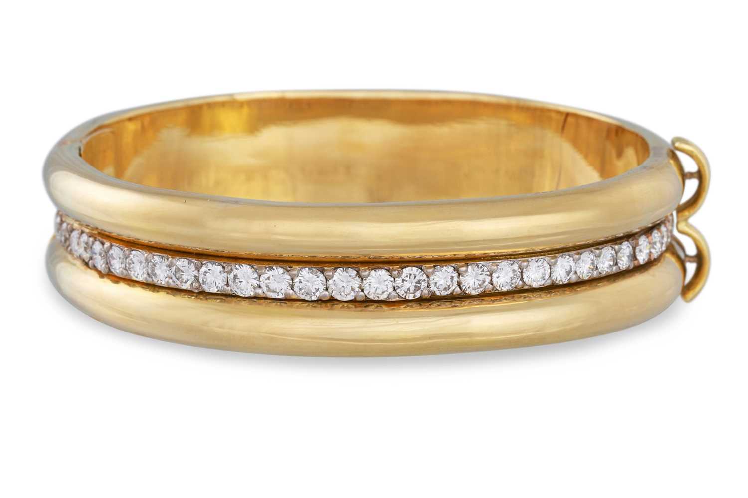 Lot 88 - A DIAMOND SET BANGLE, in 18ct white and